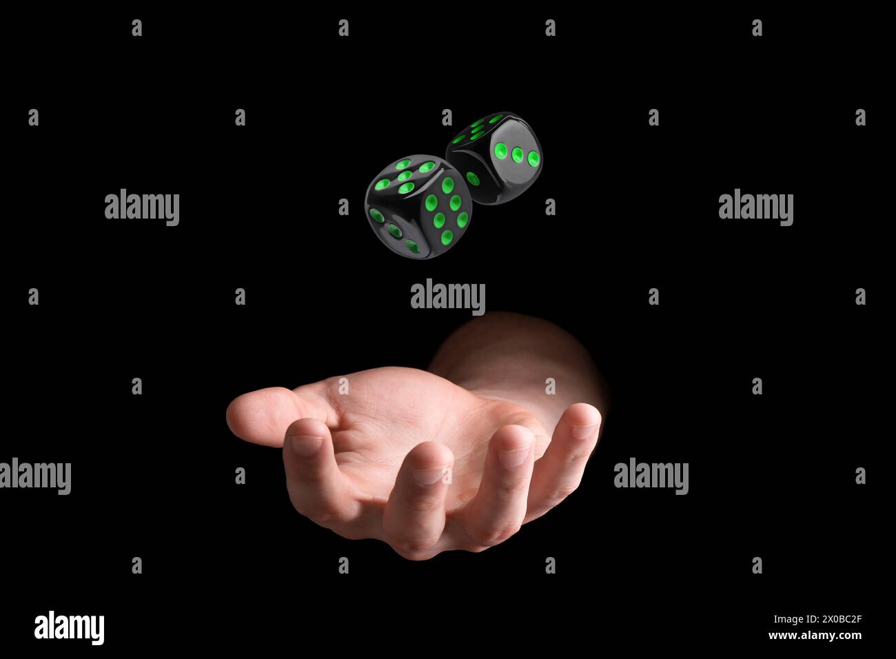 Man throwing dice on black background, closeup Stock Photo - Alamy