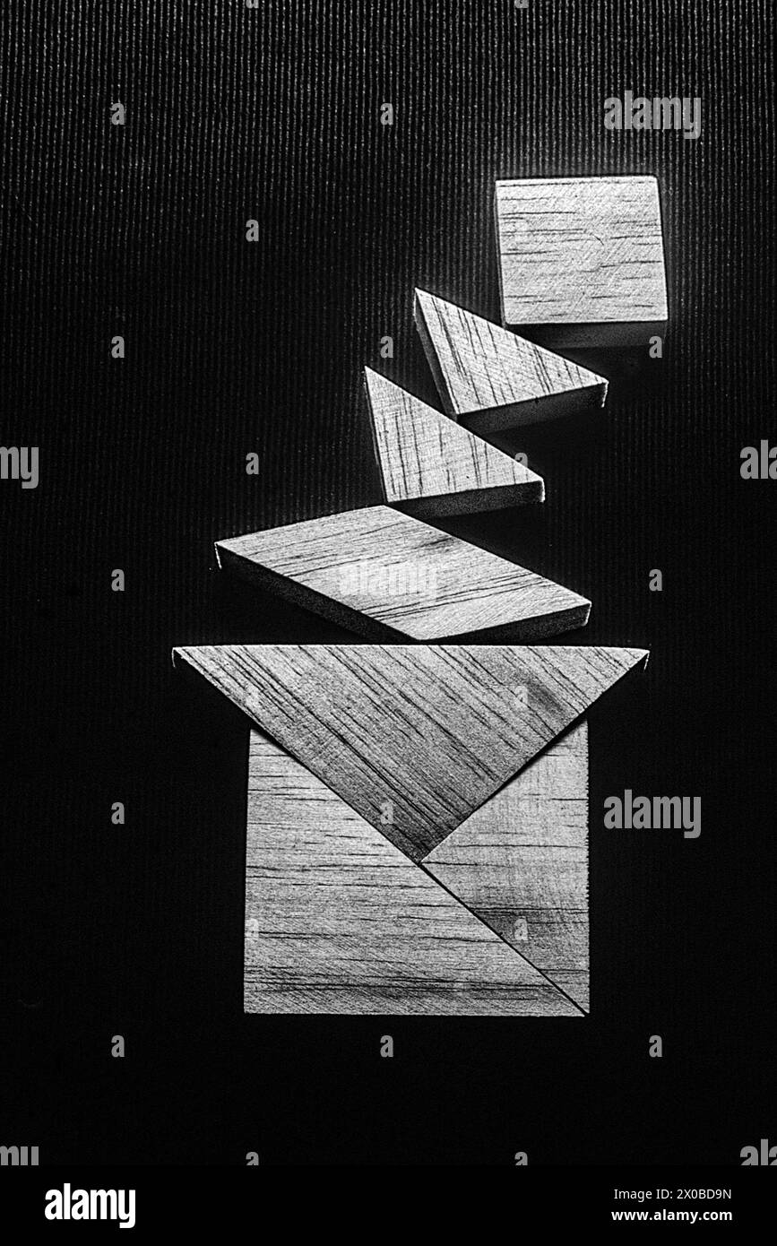 Black white tangram pieces Black and White Stock Photos & Images - Alamy