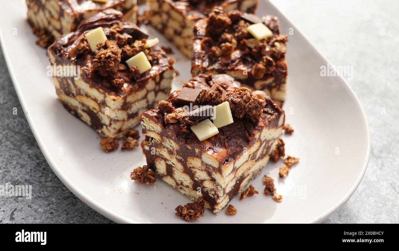 Lazy cake or mosaic cake with granola and chocolate . Homemade no bake ...