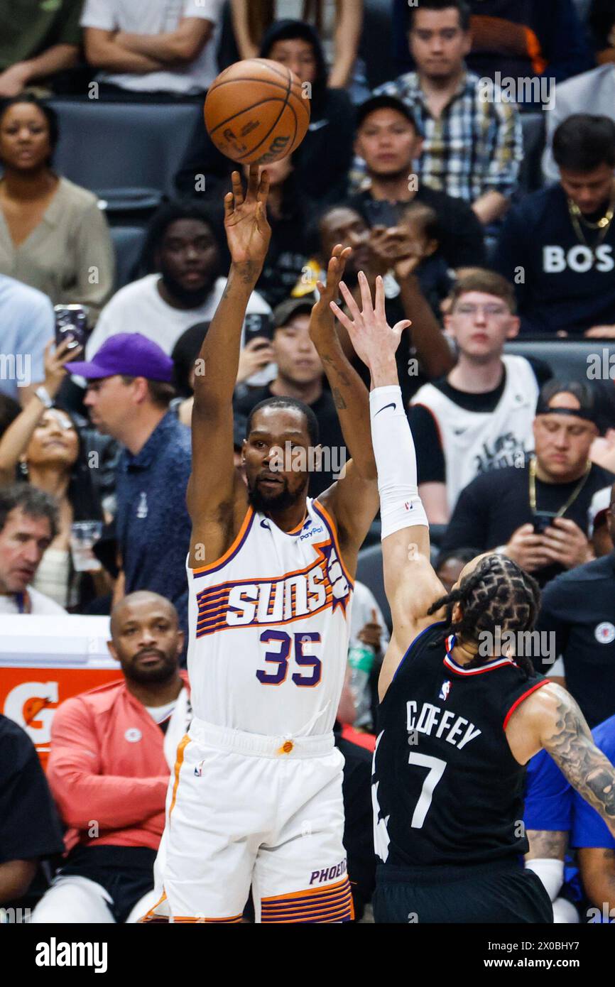Los Angeles, USA. 10th Apr, 2024. Phoenix Suns' Kevin Durant (L) shoots ...