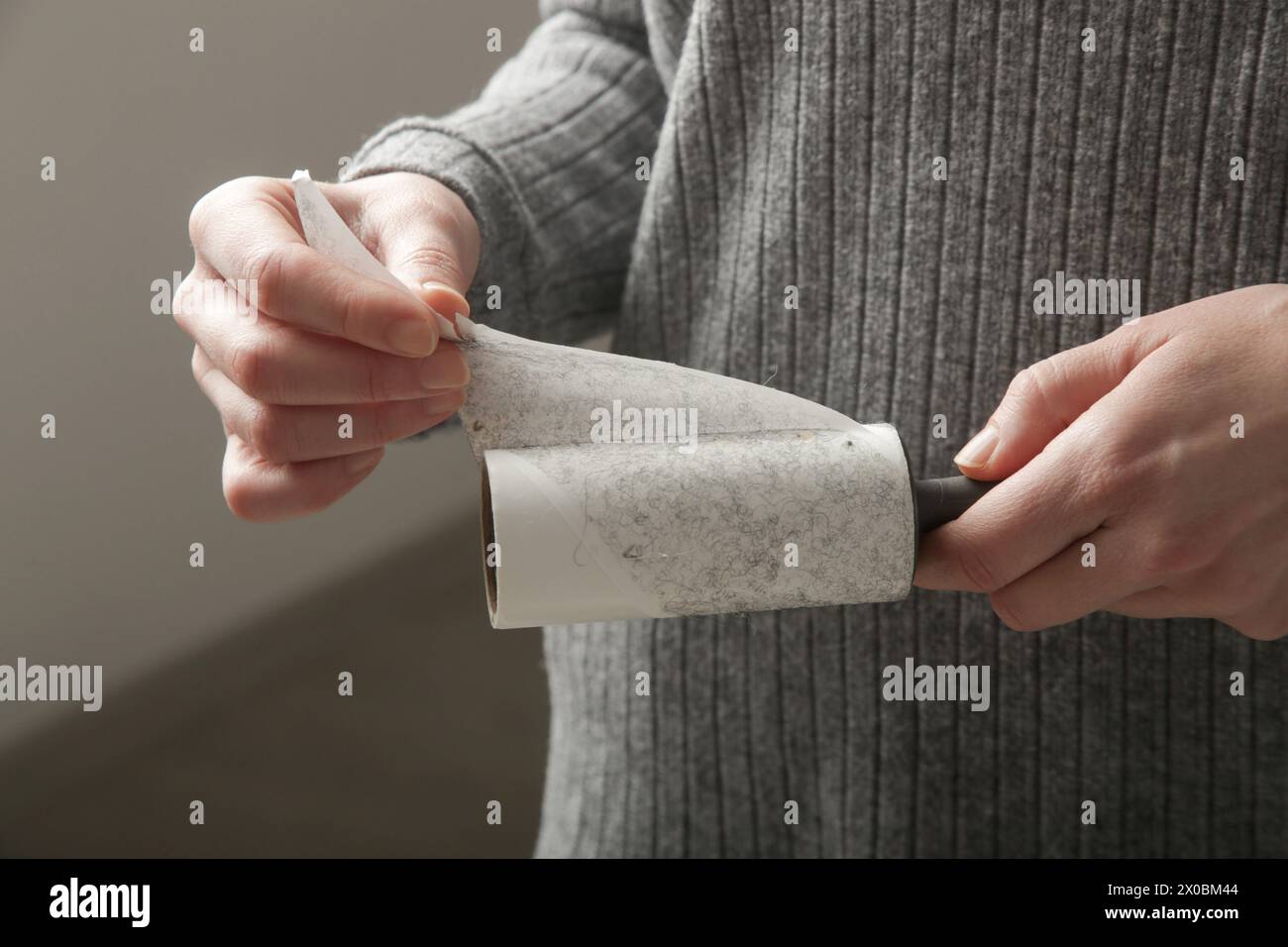 Lint roller adhesive roll hi-res stock photography and images - Alamy