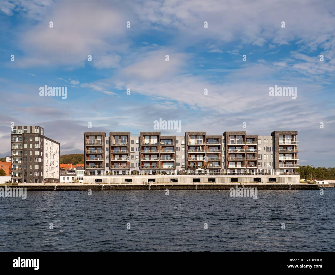 Modern waterfront apartment complex in Nørresundby overlooking Limfjord ...