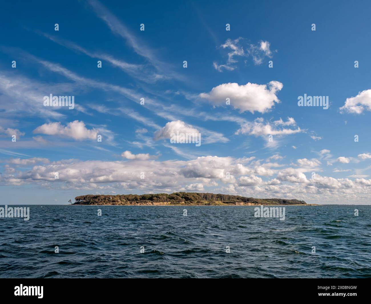Coastline of Aebelø Island with forest and bluffs in Kattegat north of ...