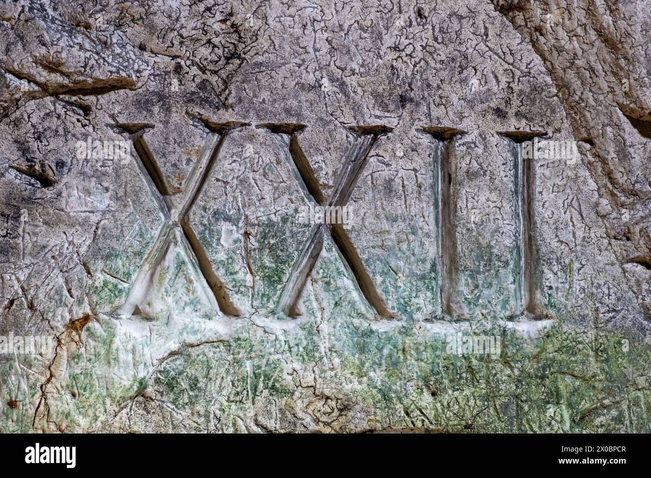 XXII Roman numerals carved into the tunnel walls in the Hellfire cave ...