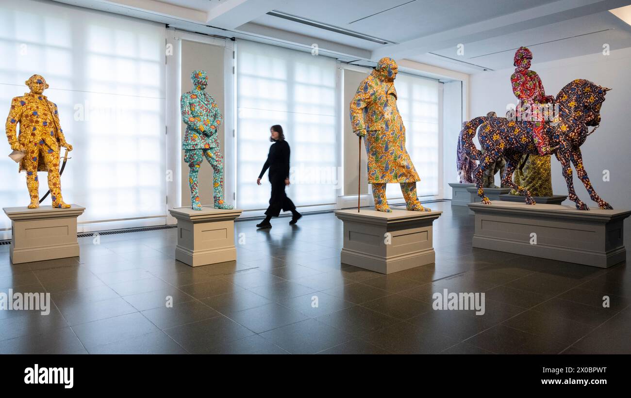 London, UK. 11 April 2024. A staff member with ‘Decolonised Structures ...