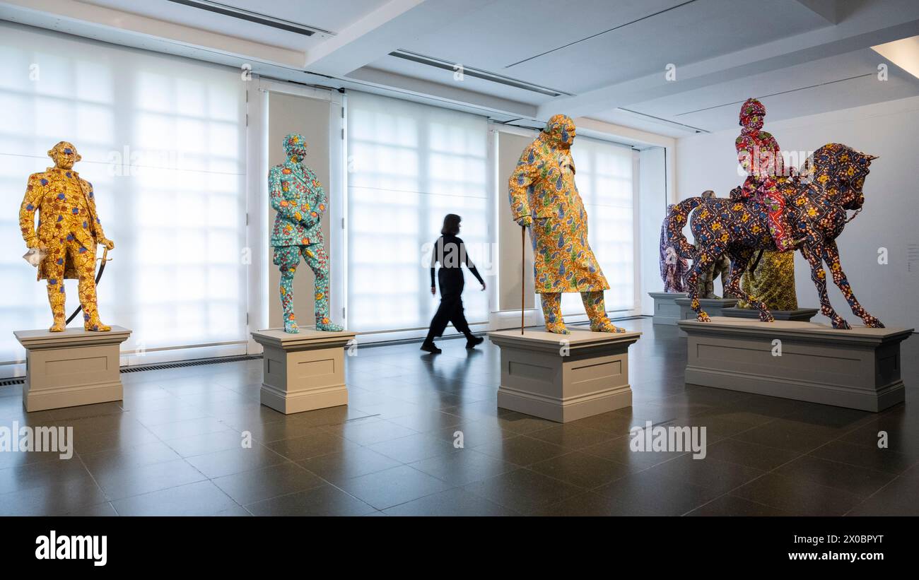 London, UK. 11 April 2024. A staff member with ‘Decolonised Structures ...