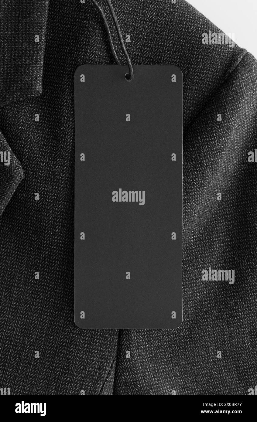 Black tag mockup on a black suit Stock Photo - Alamy