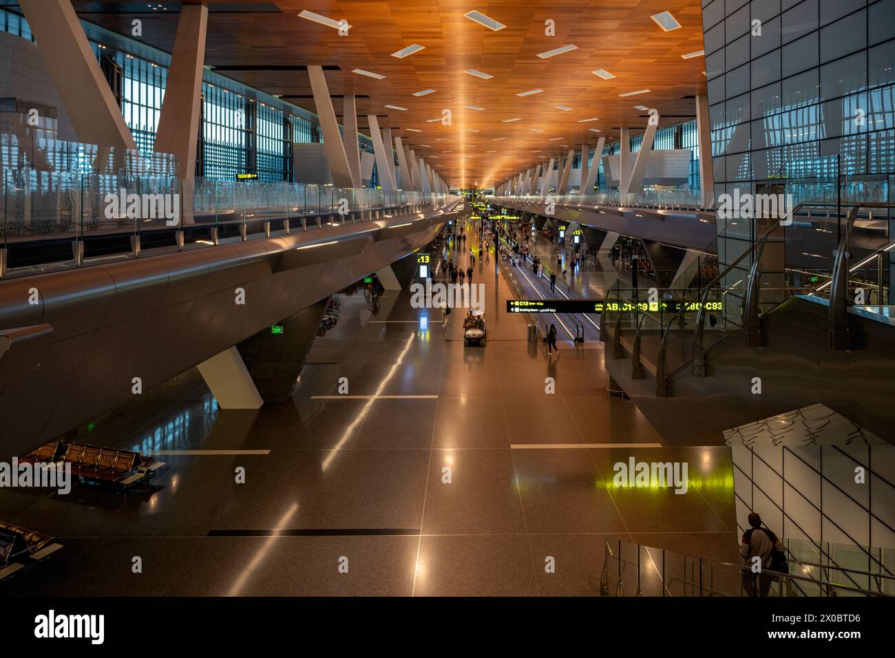Hamad International Airport Terminal with all gates and Travelers ...