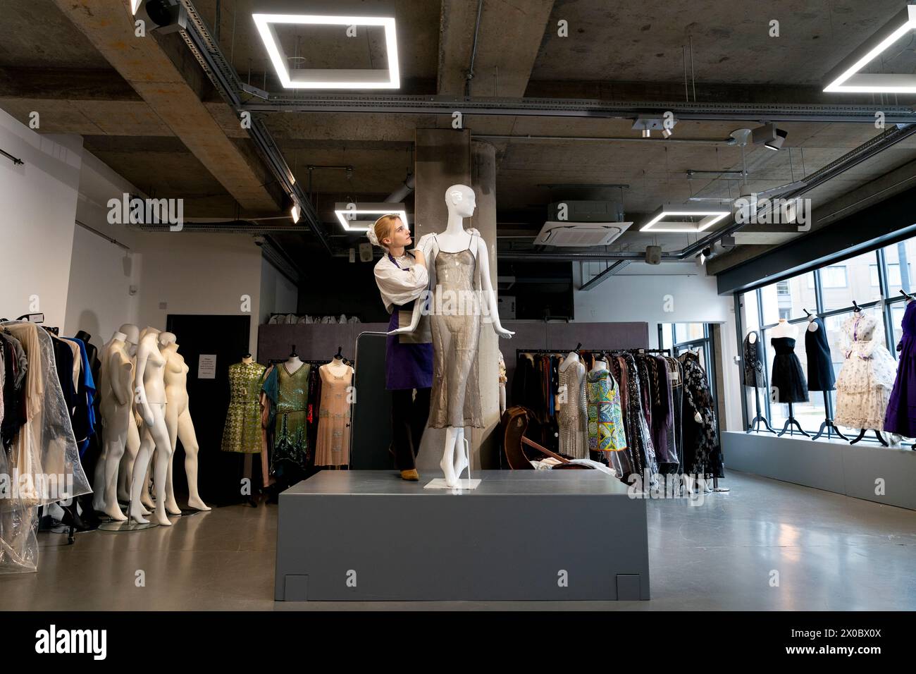 Julia Westerman, Cataloguer at Kerry Taylor Auctions handles a Liza ...