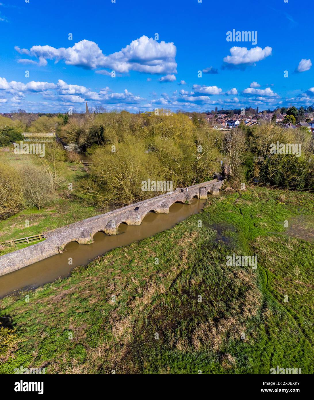 An aerial view along the packhorse bridge beside the Grand Union Canal ...