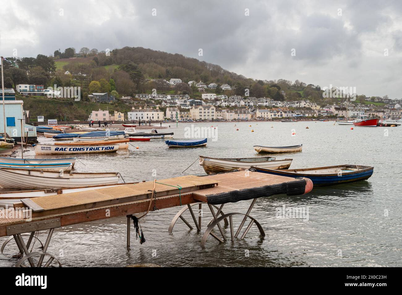 Boats moored on the Teignmouth estuary side of the river Teign looking ...