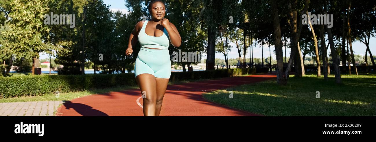Curvy African American woman elegantly runs outdoors, motivation and ...