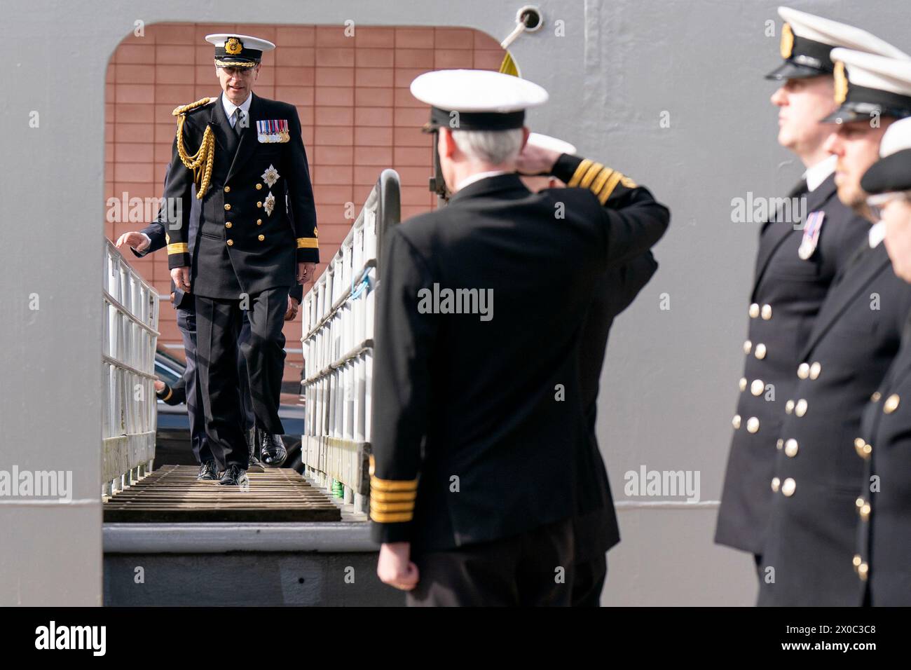 Prince Edward, the Duke of Edinburgh, boards the ship ahead of the ...