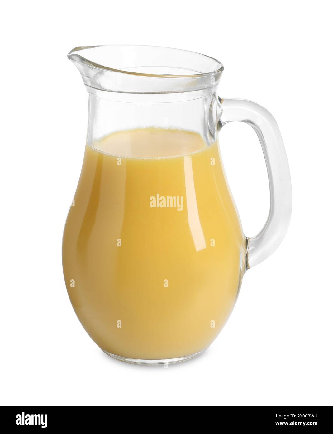 Refreshing orange juice in jug isolated on white Stock Photo - Alamy