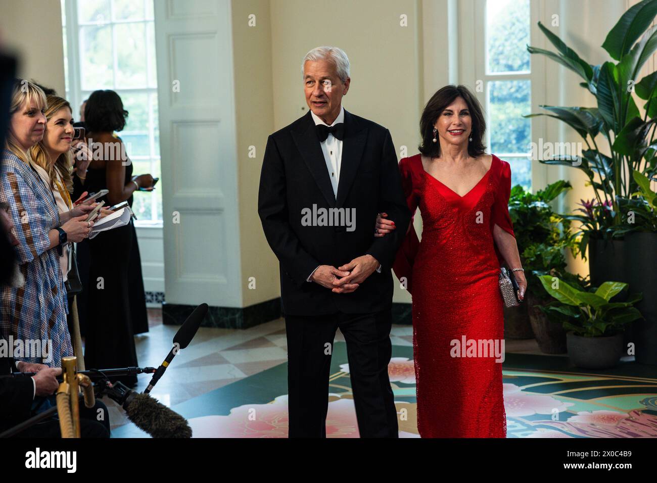 Jamie Dimon, chairman and ceo of Chase Bank, and Judy Dimon, arrive for ...