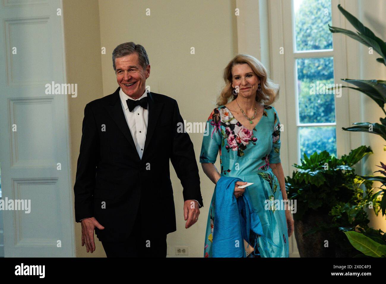 Governor Roy Cooper (Democrat of North Carolina), and Kristin Cooper ...