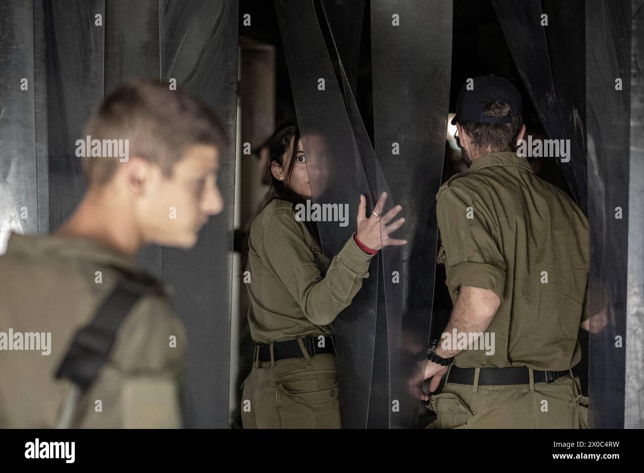 Nir Oz, Israel. 11th Apr, 2024. Israeli soldiers visit a destroyed ...