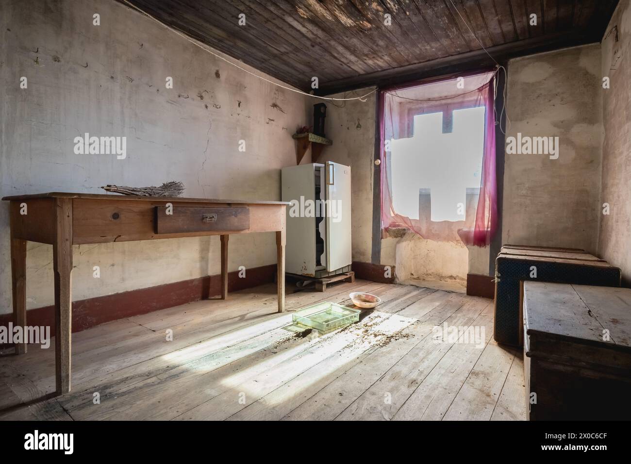 interior of an old abandoned stone house typical of northern portugal ...