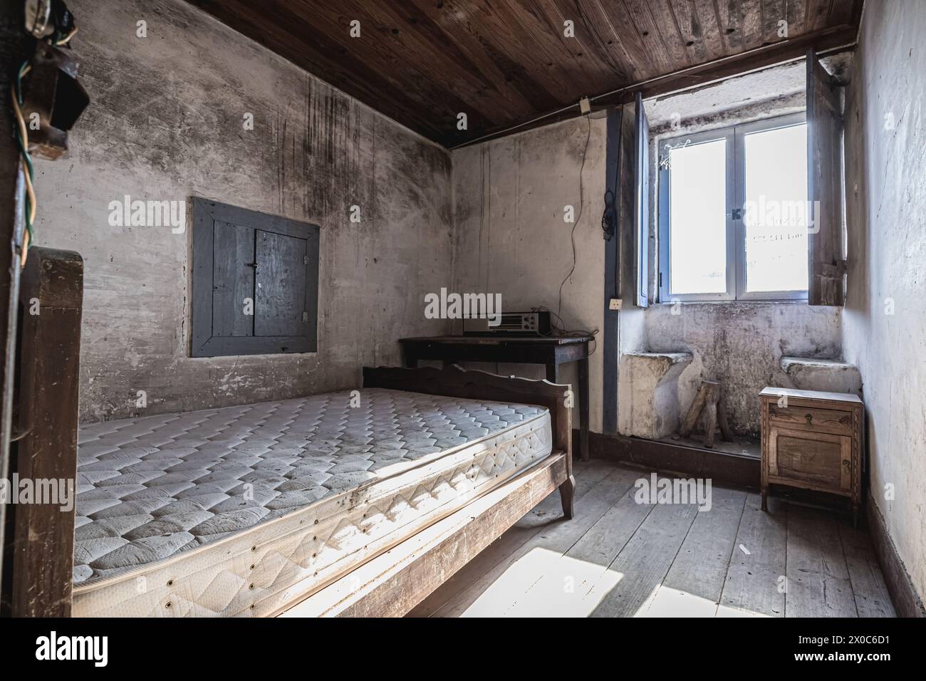 interior of an old abandoned stone house typical of northern portugal ...
