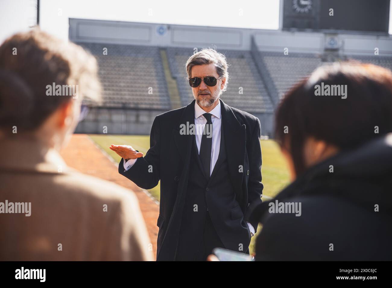 Interview of private investor at press conference for TV news ...