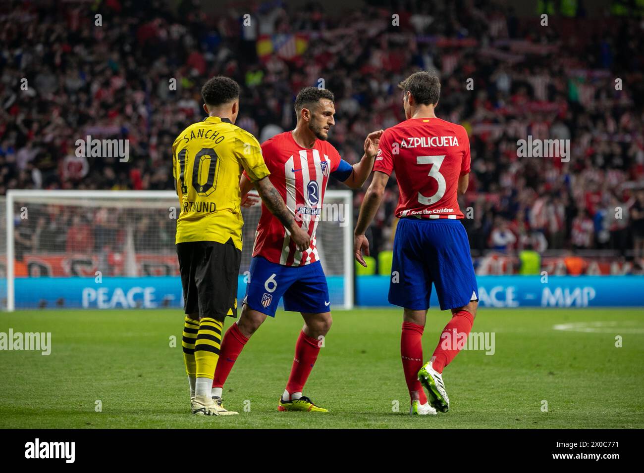 In the image Jadon Sancho (L) player of Borussia Dotmund, Koke (C) of ...