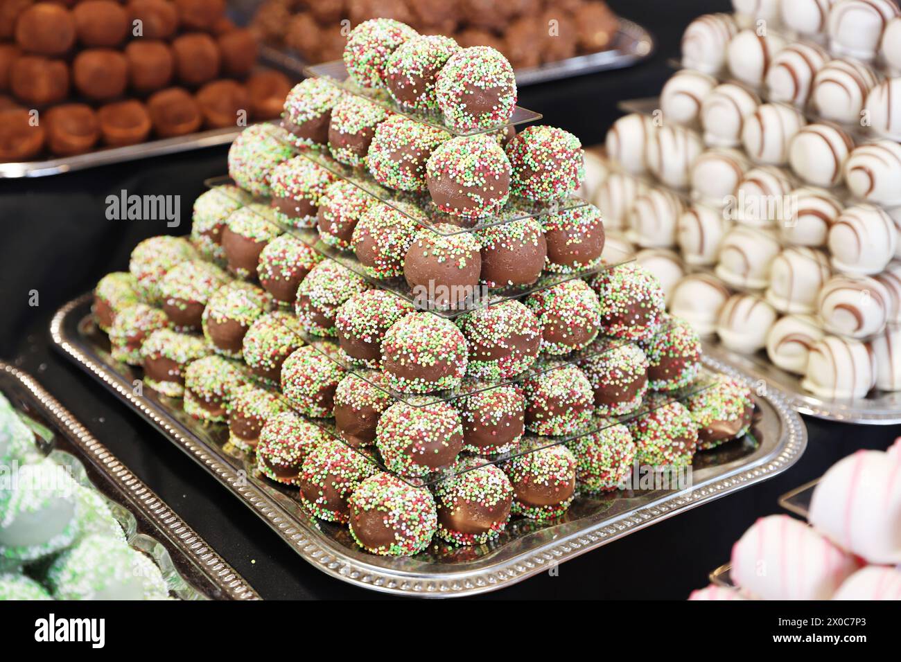 Chocolate marzipan candies filled various flavors. Sweetness balls ...