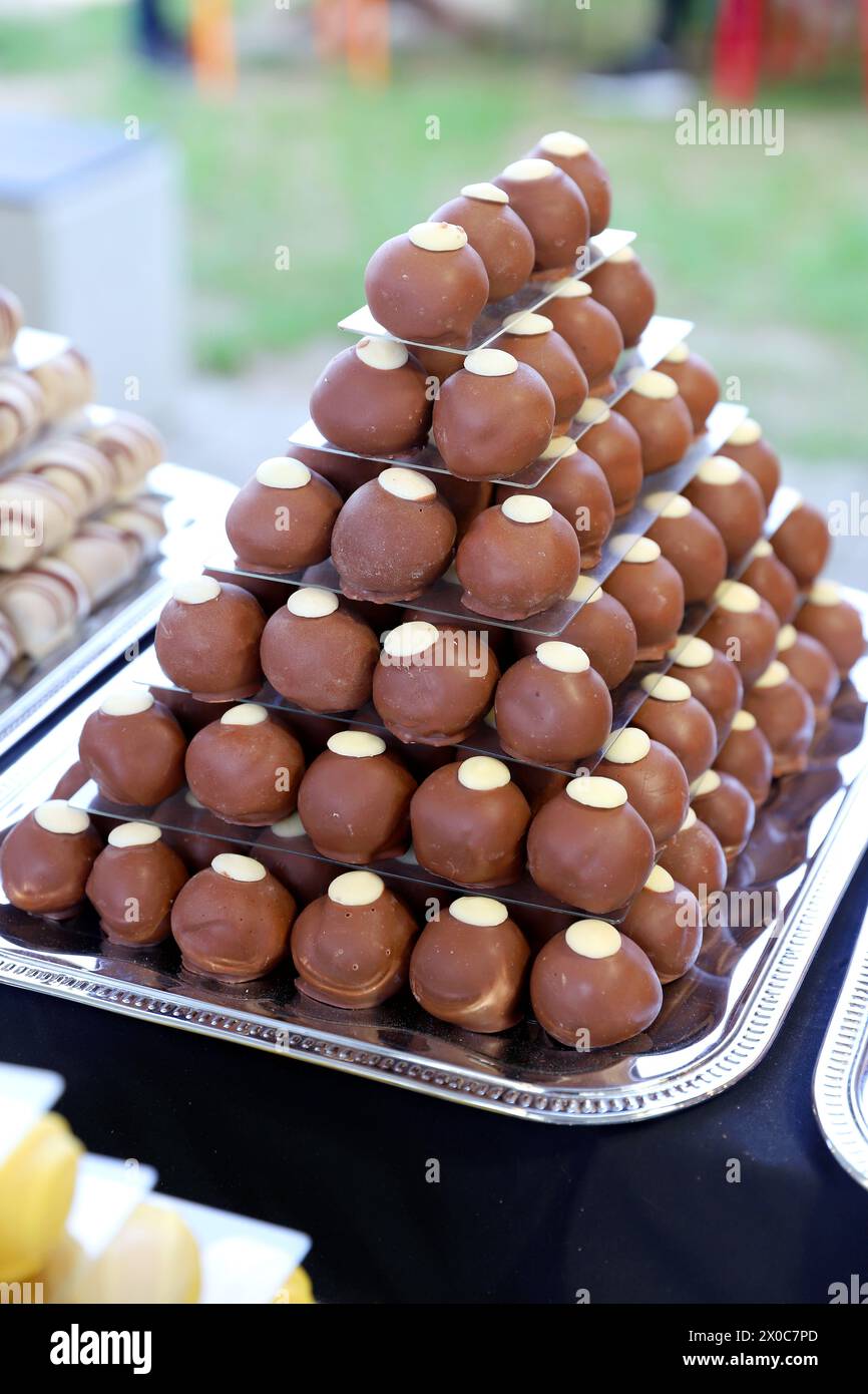 Chocolate marzipan candies filled various flavors. Sweetness balls ...