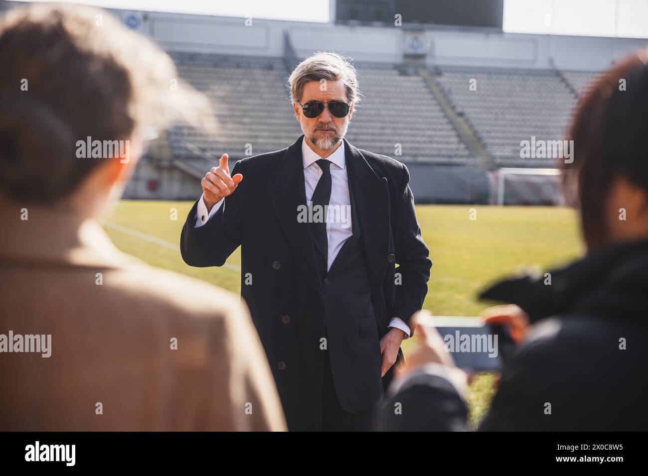 Interview of private investor at press conference for TV news ...