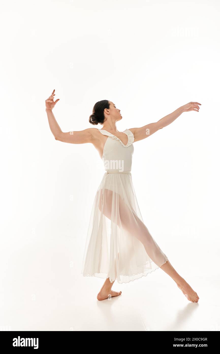Woman dancing with long dress hi-res stock photography and images - Alamy