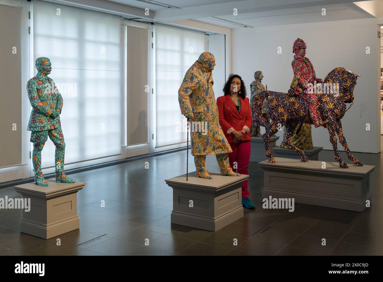 LONDON, UNITED KINGDOM - APRIL 11, 2024: A staff member stands among ...