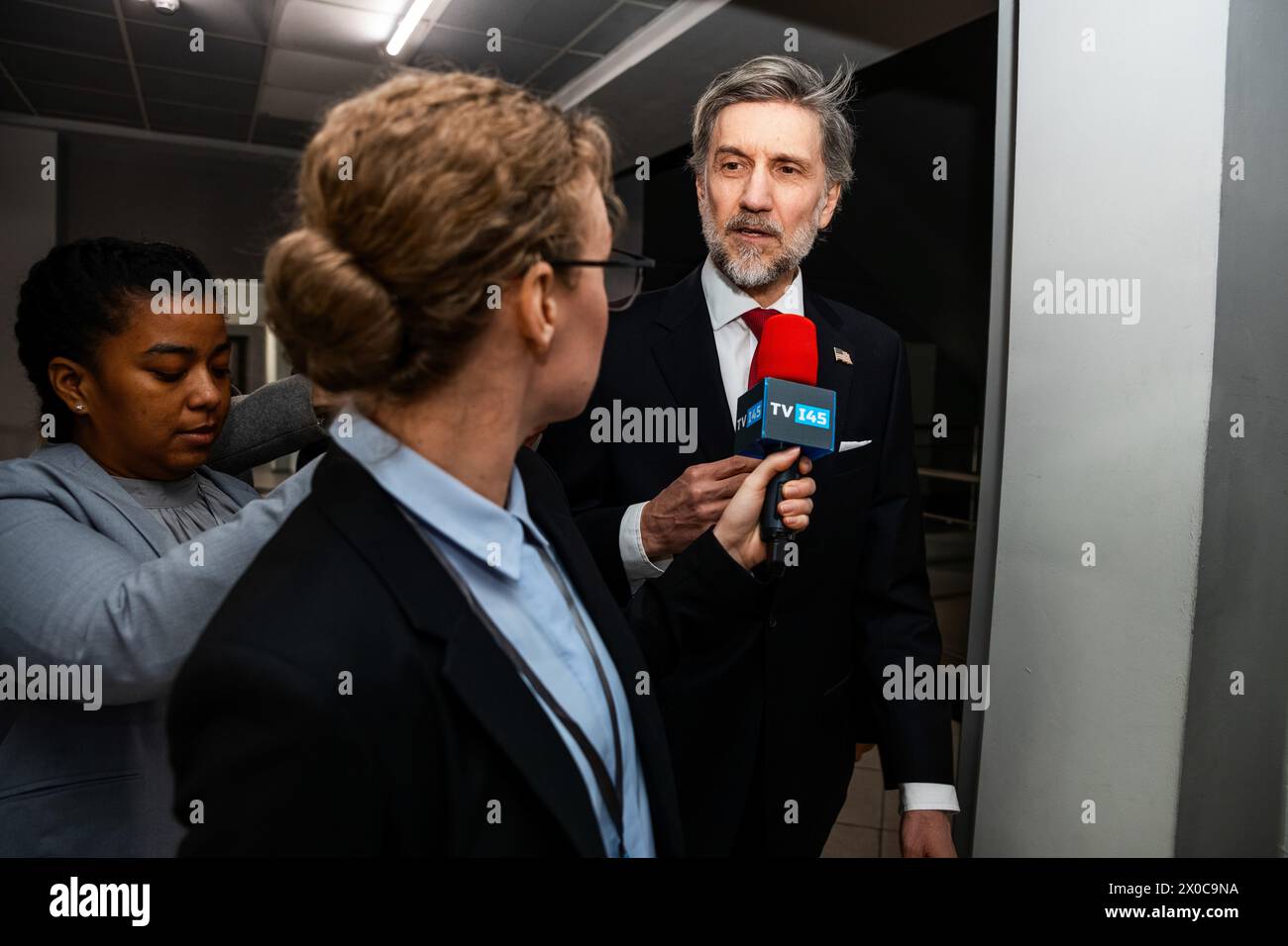 Busy republican politician walks in government building, answers press ...