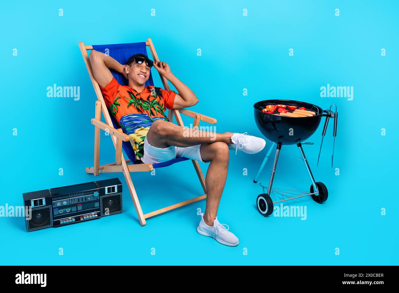 Full length photo of dreamy funky guy dressed print shirt relaxing ...