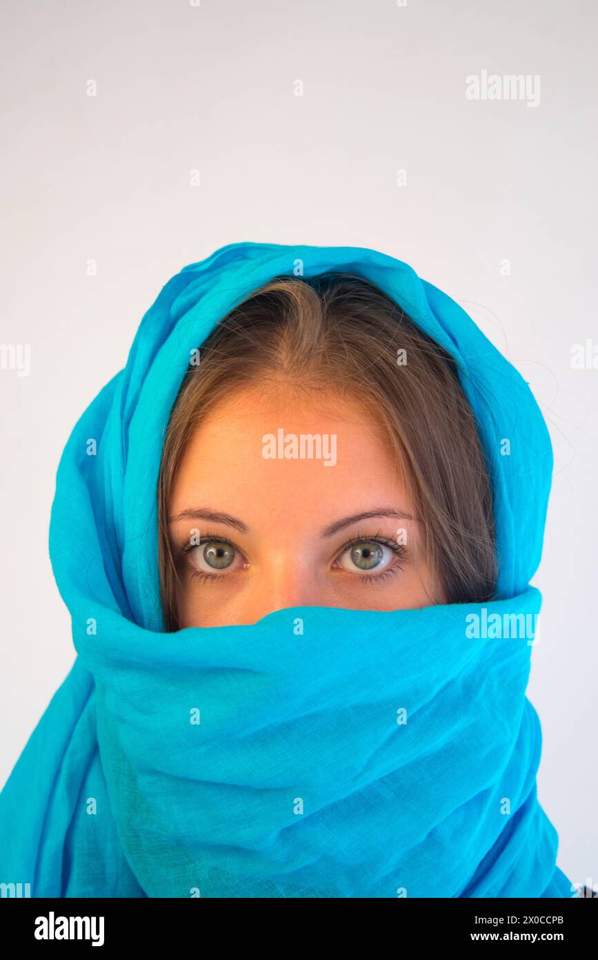 Women wearing turquoise color hi-res stock photography and images - Alamy