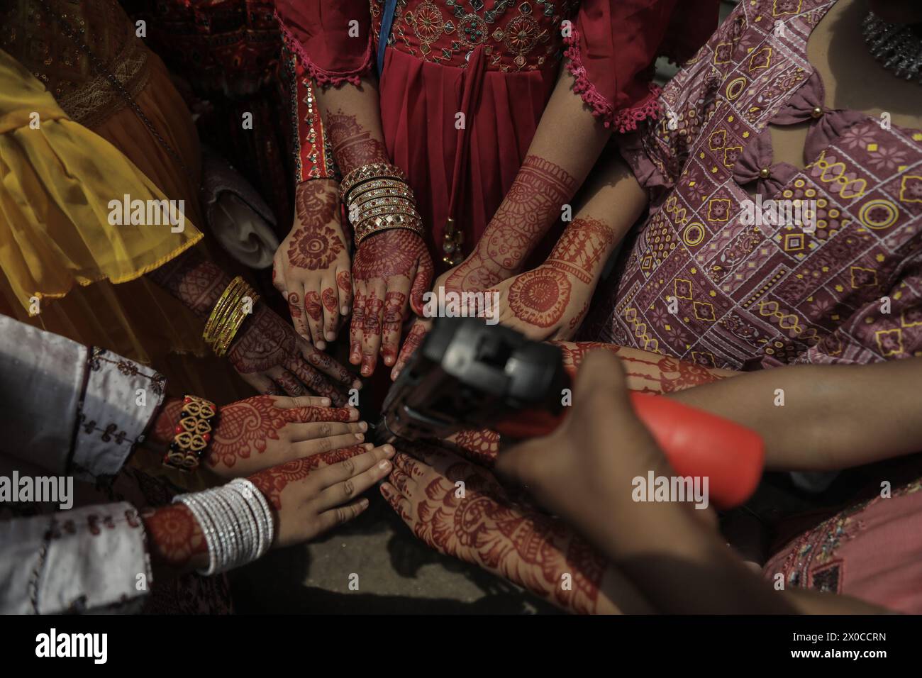 Dhaka, Bangladesh. 11th Apr, 2024. A boy is pointing a toy gun while ...