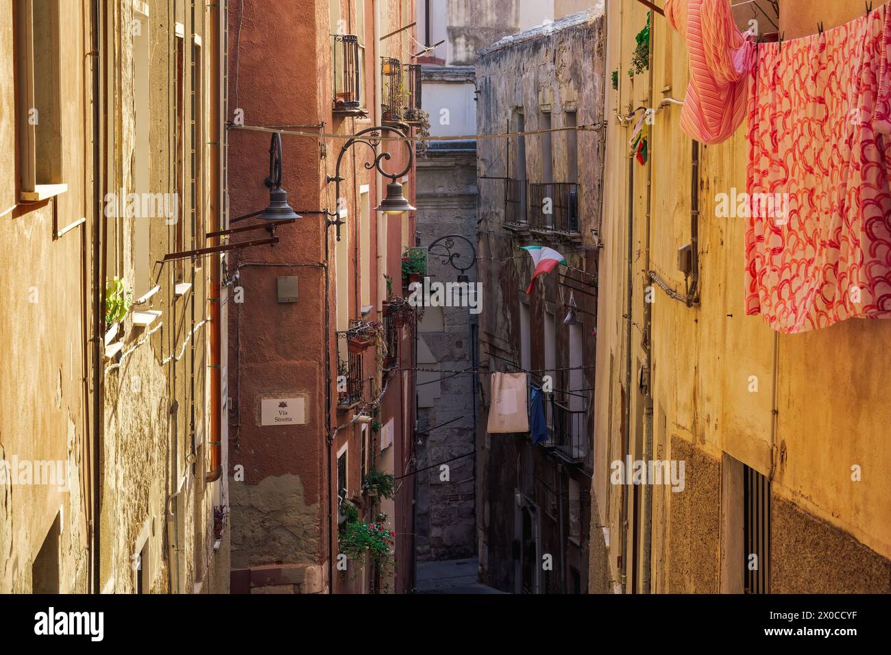 Cagliari citadel alley with traditional buildings with iron balconies ...