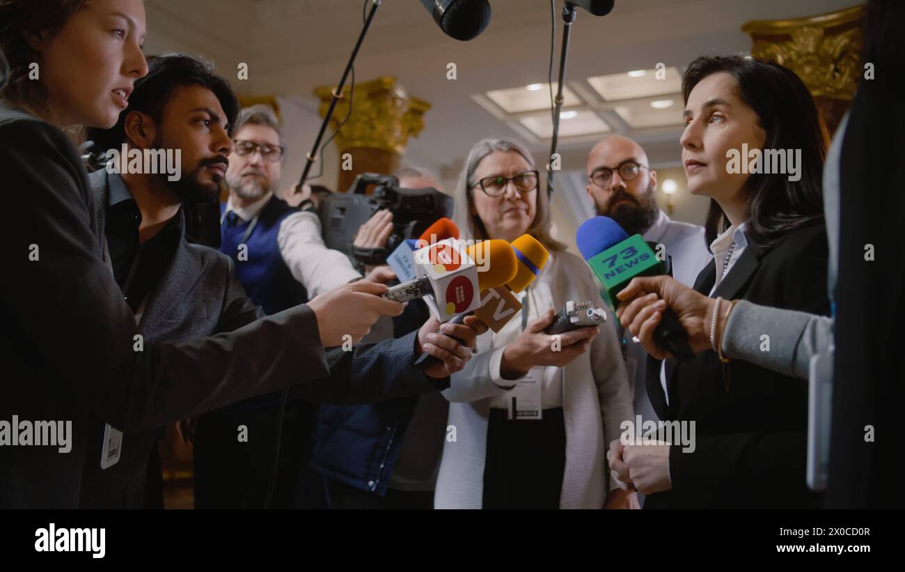 Politician answers press questions and gives interview for television ...