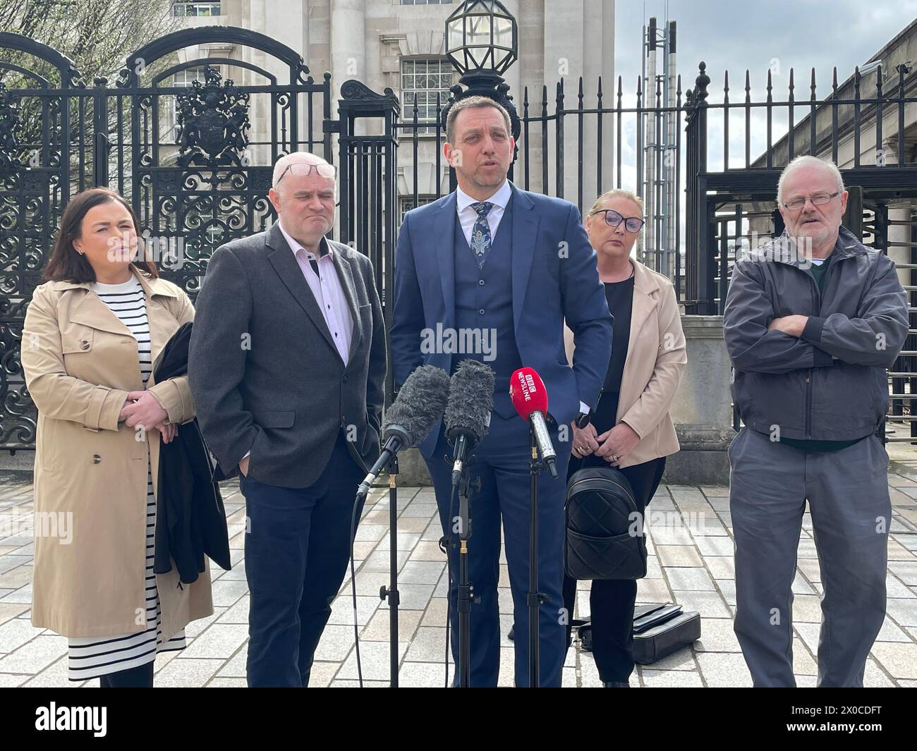 Solicitor Padraig O Muirigh (centre) with members of the families of ...