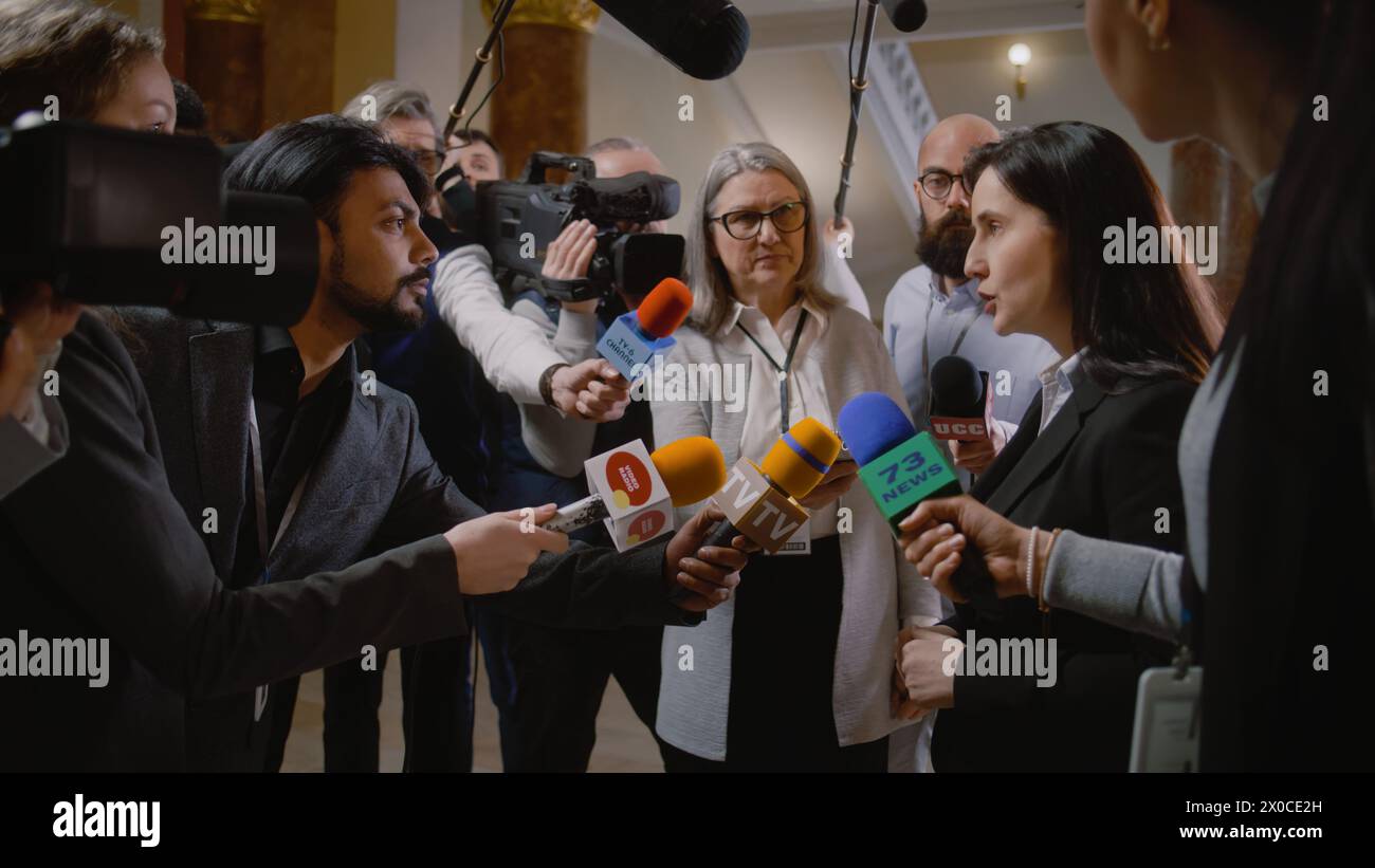 Politician answers press questions and gives interview for television ...