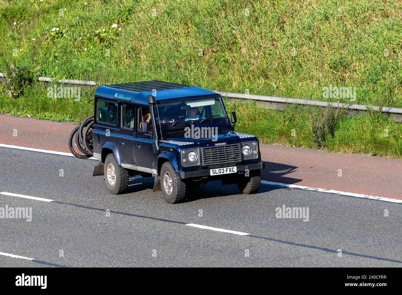 2003 Blue Land Rover Defender 110 TD5 XS; Sport utility vehicle ...