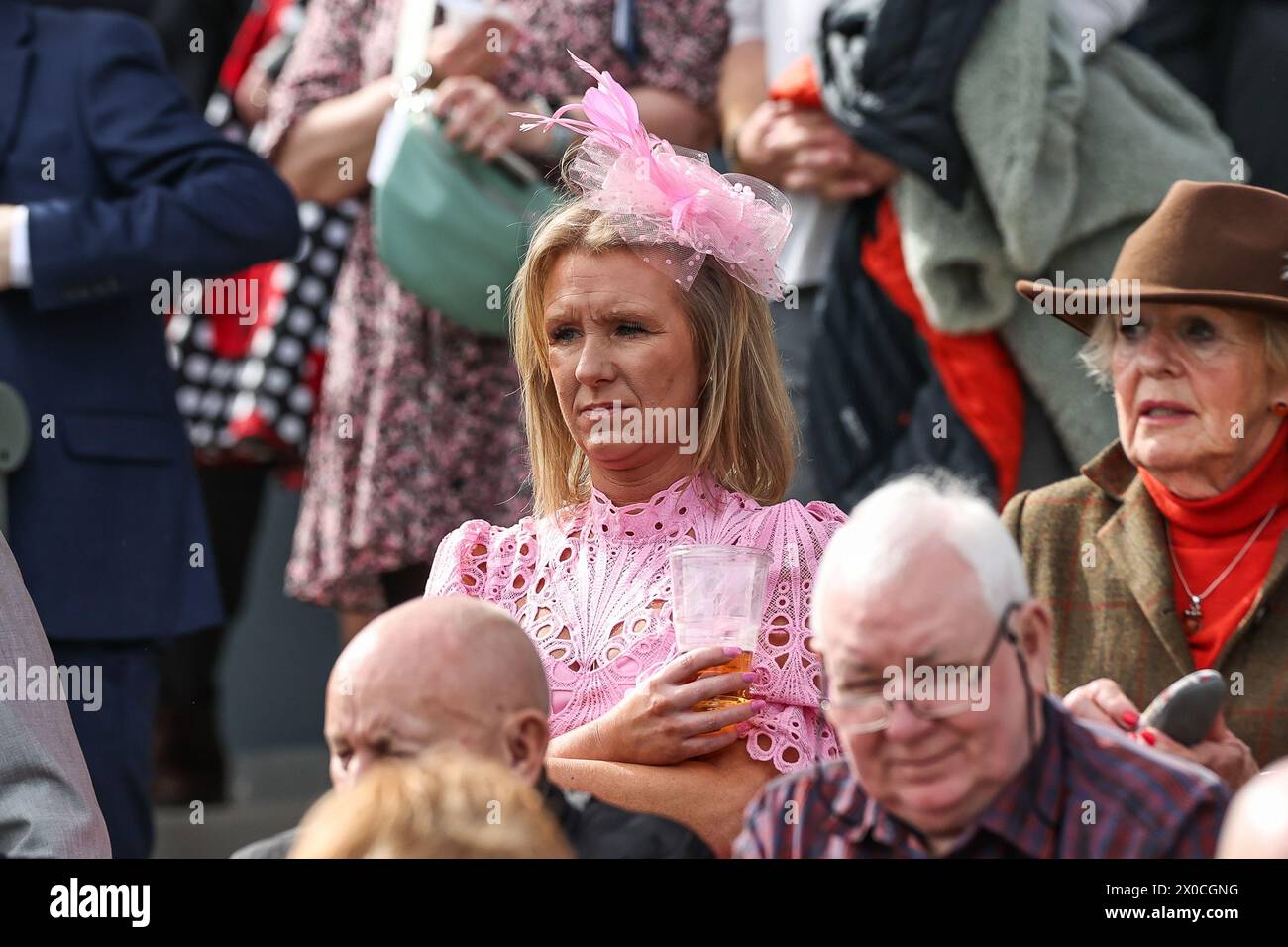 Racegoers during the Randox Grand National 2024 Opening Day at Aintree ...