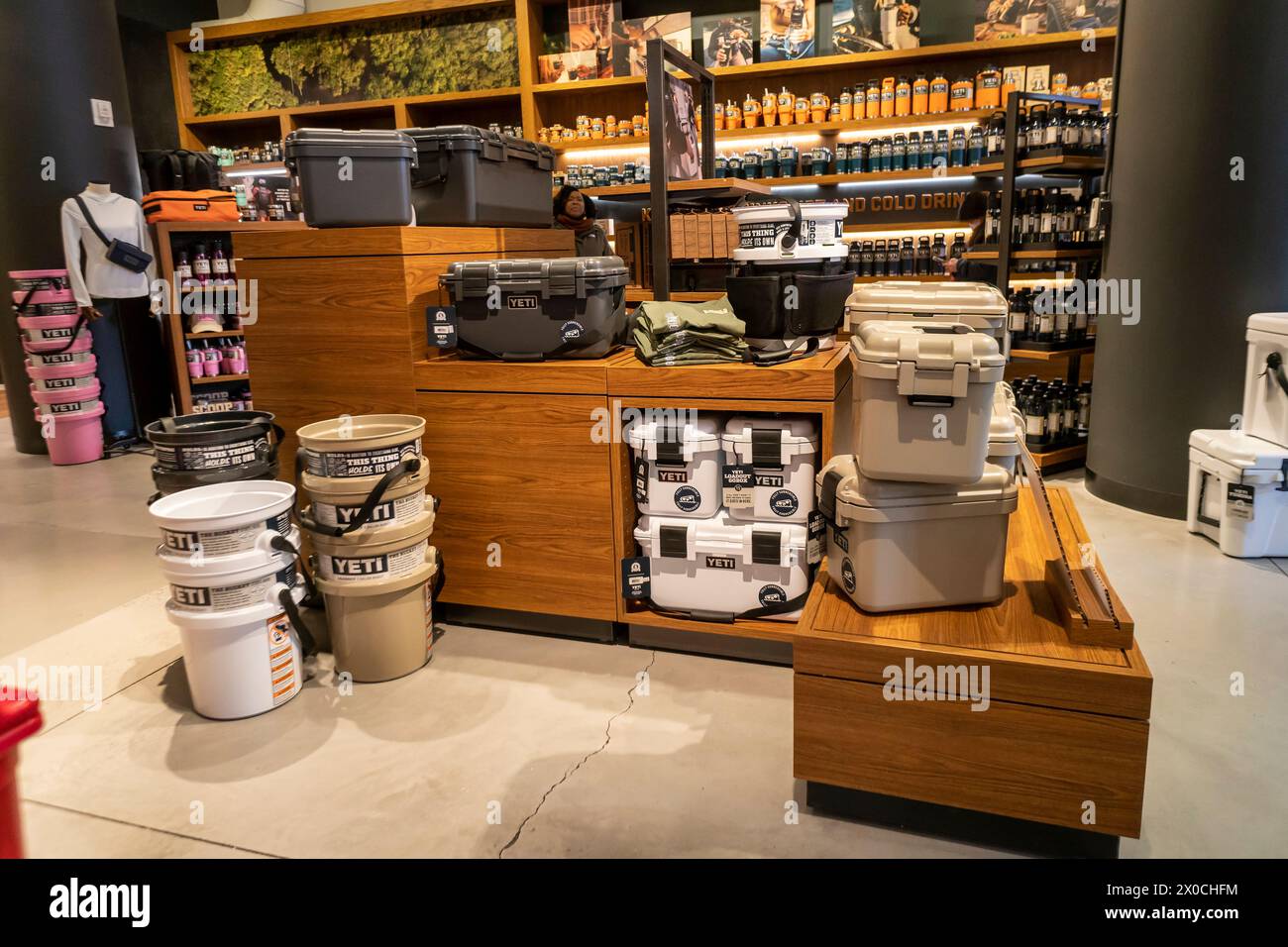 Customers browse merchandise at the grand opening of the Yeti store in ...