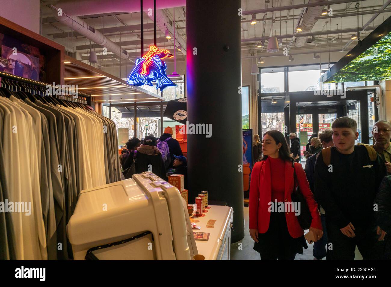 Customers browse merchandise at the grand opening of the Yeti store in ...