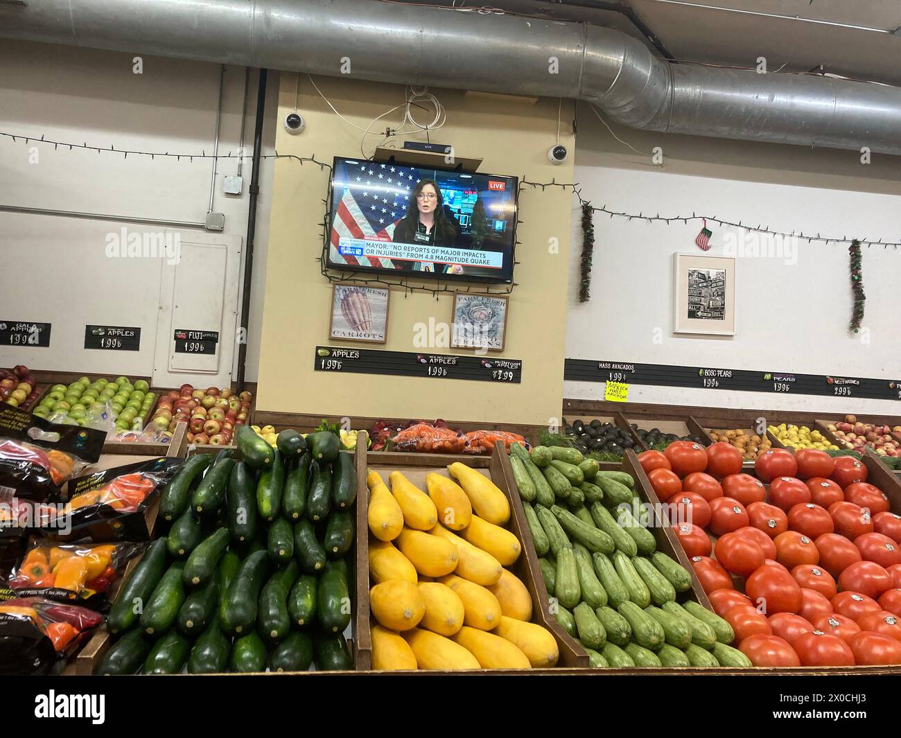 A television in a grocery store in New York’s Hell’s Kitchen ...