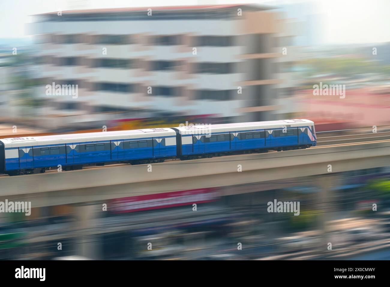 High speed commuter electric train race station on the stage road ...