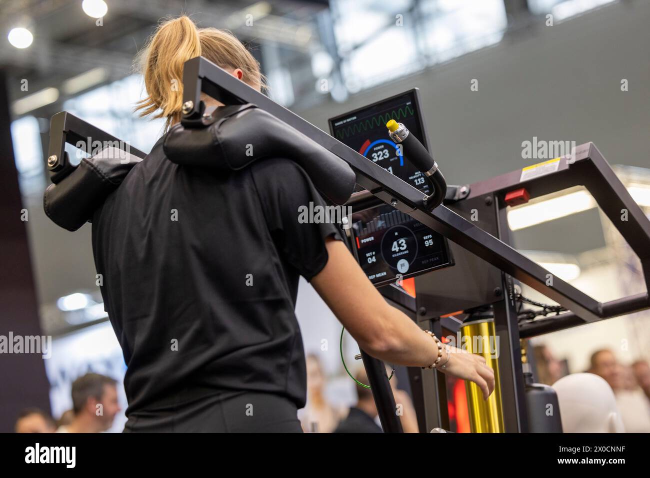 Cologne, Germany. 11th Apr, 2024. People train on strength machines at ...