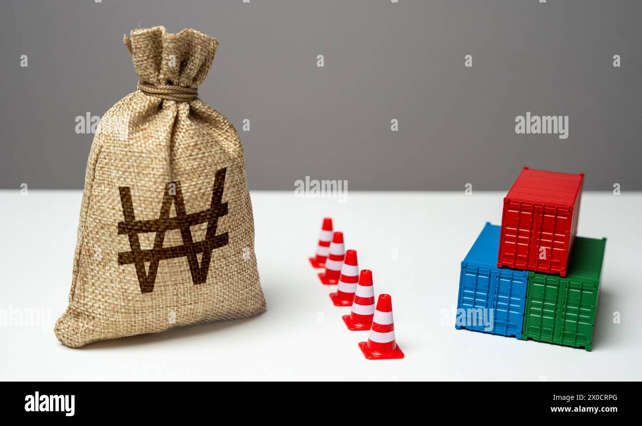 Shipping containers with goods and south korean won money bag are ...