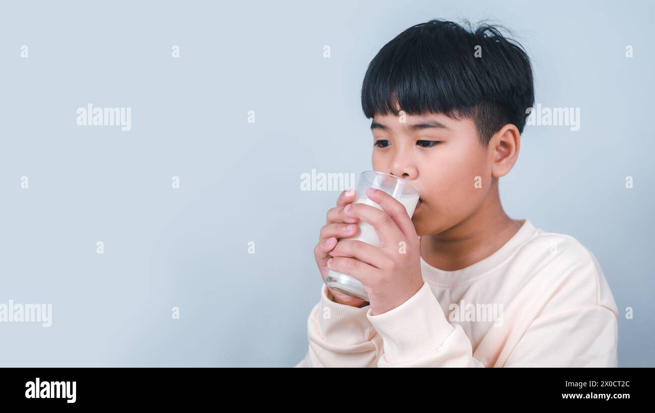 Concept of happy good nutrition, Portrait of a little young handsome ...