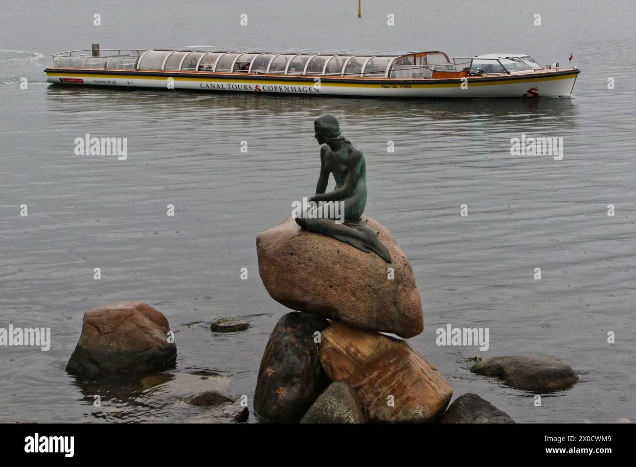 Canal tours Copenhagen and little mermaid statue Copenhagen Denmark April 2024 Stock Photo - Alamy