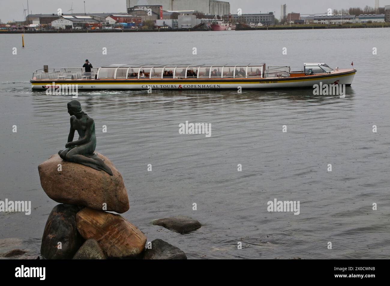 Canal tours Copenhagen and little mermaid statue Copenhagen Denmark April 2024 Stock Photo - Alamy