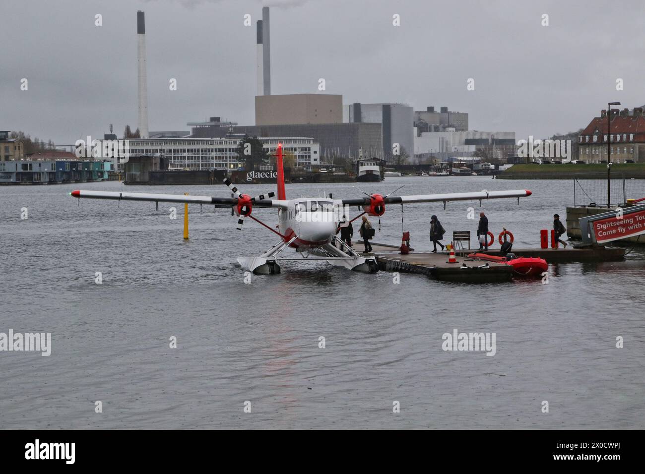 Passengers boarding red and white seaplane Copenhagen Denmark April ...